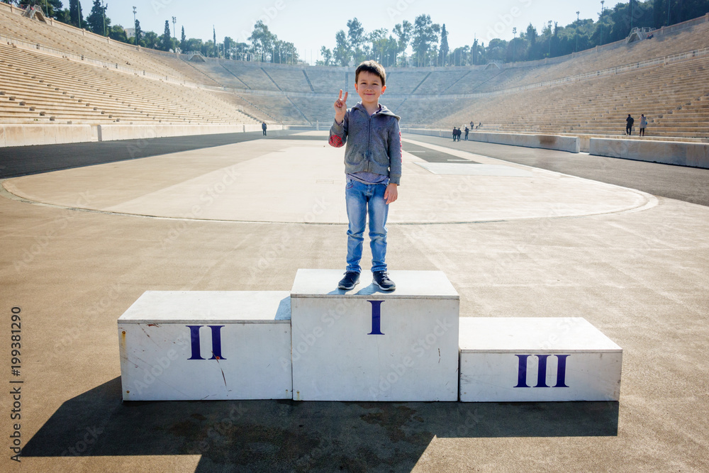 Boy on winner's podium at Panathinaiko Stadium, Athens, Greece, Europe ...