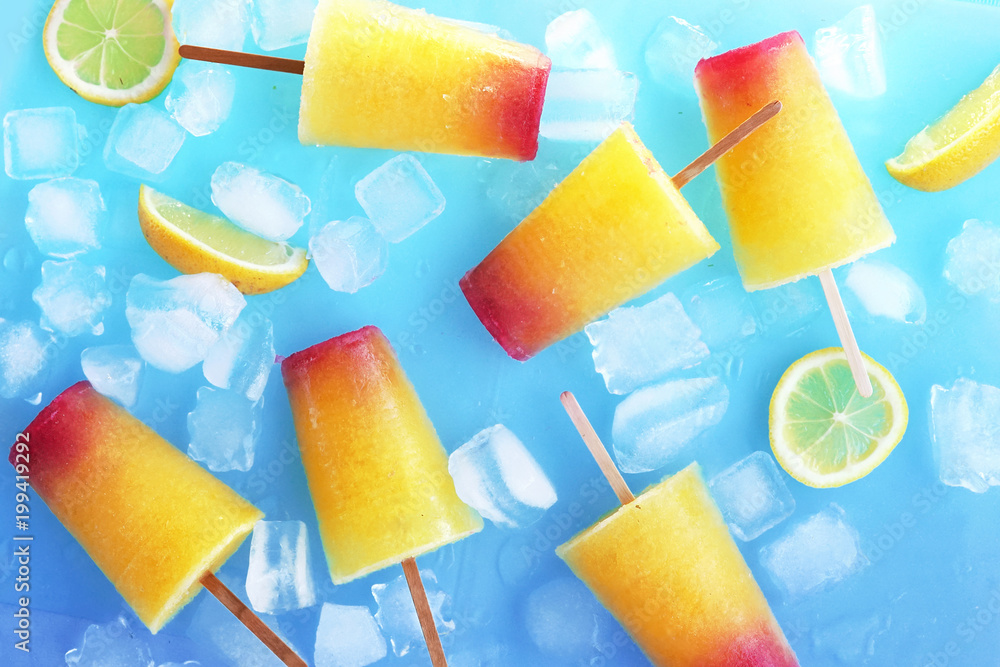 Sweet refreshing summer food concept. Ice cream fruit ice yellow orange ...