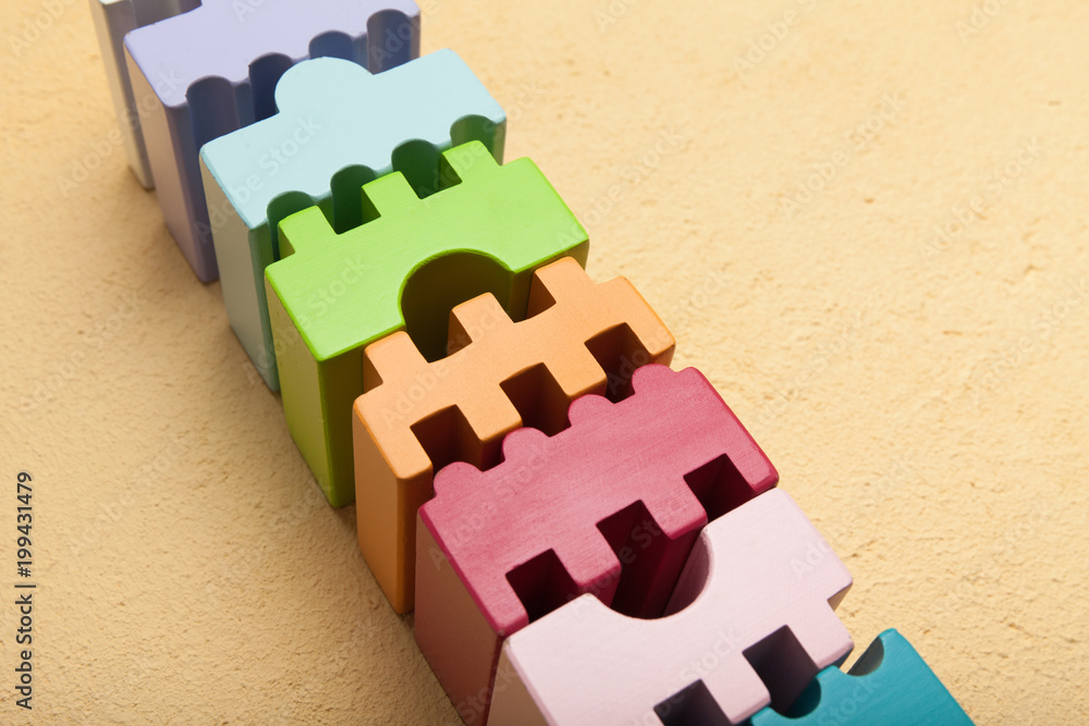 Cubes of different shapes in a row, team building concept. Stock Photo ...