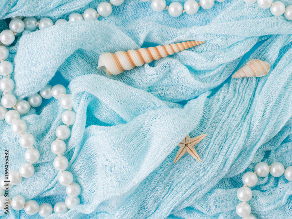 Shells of various kinds on a blue background. Seashells and starfish on ...