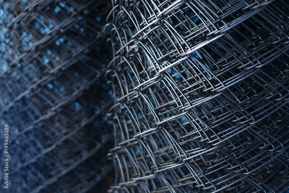 Metal mesh in roll. Building and metal structure background. Stock ...