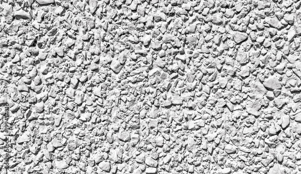 White rough stone wall for designers background texture, relief ...
