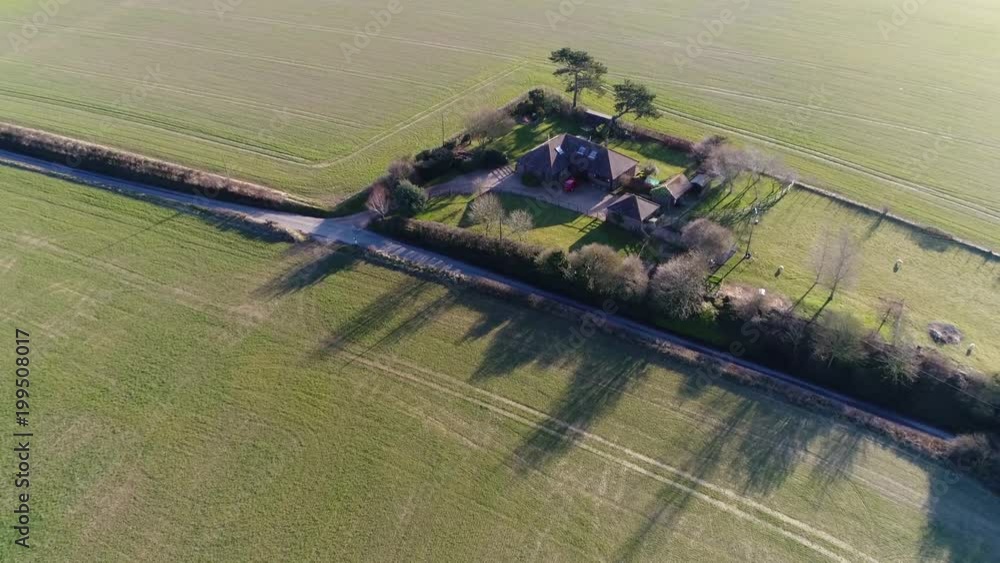 Aerial view flight over single-family detached home stand-alone house ...