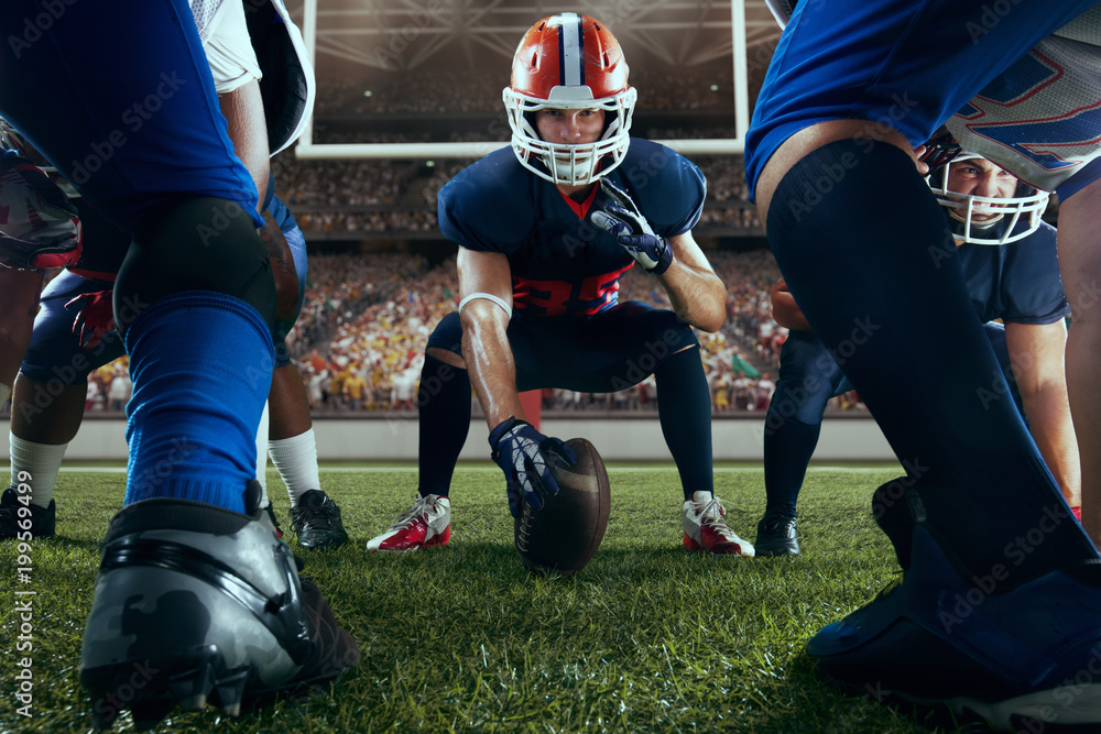 American football players preforms an action play in professional sport ...