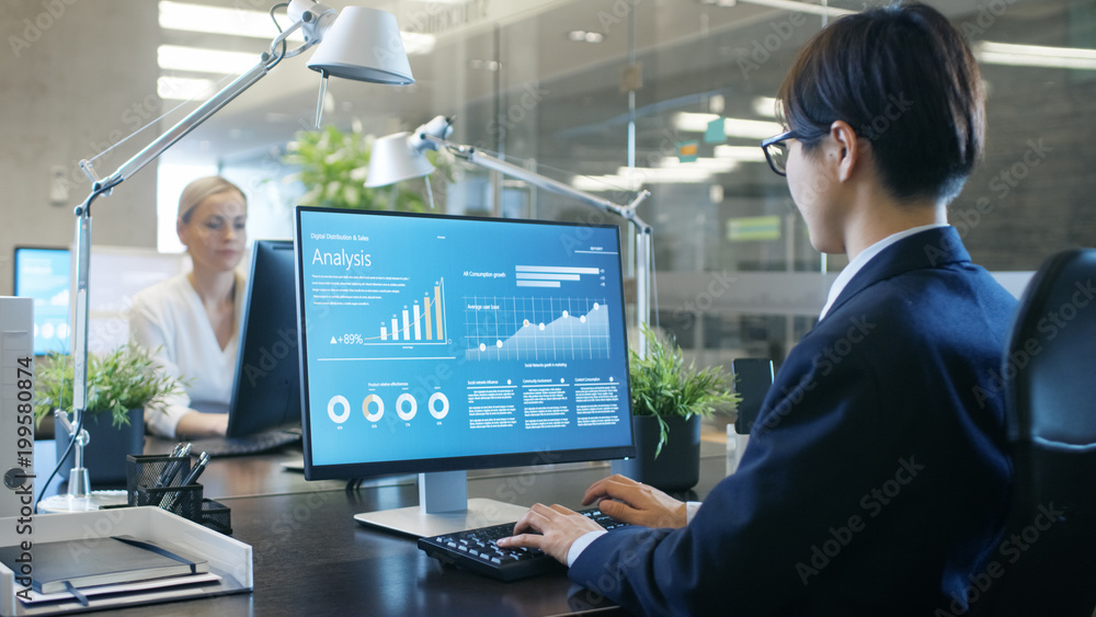 In the Office Businessman works at His Desk, He's Using Personal ...