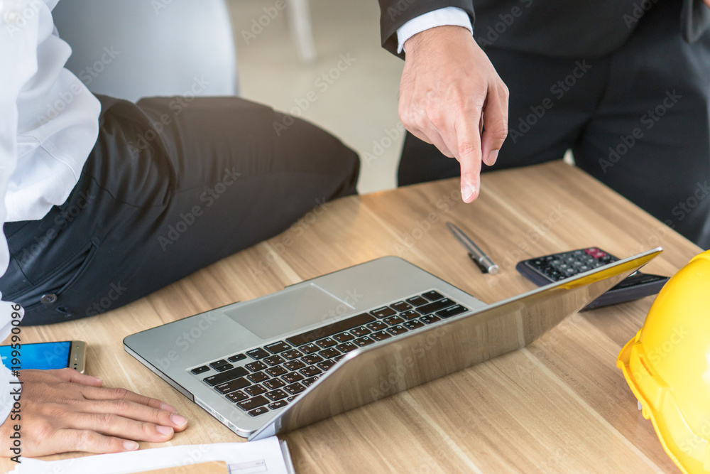 Business team meeting discuss work plan. manager and employee pointing ...