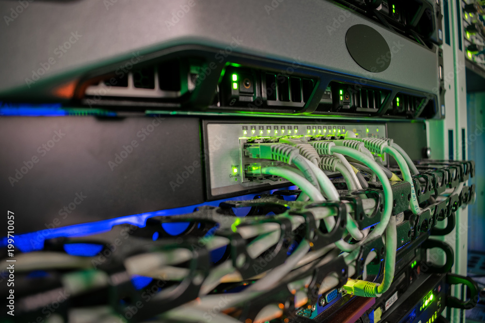 Servers and switches are located in the server room of the data center ...