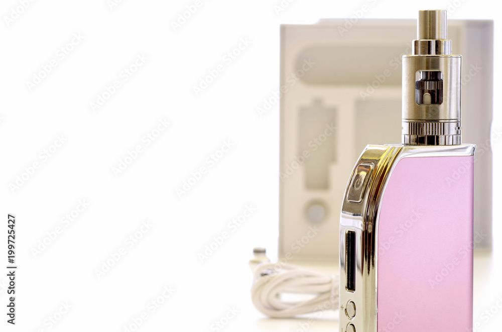 E-cigarette and atomizers with box and spares over a white table ...