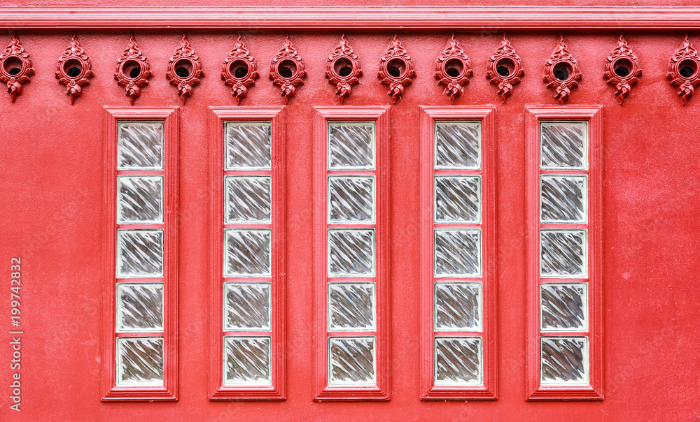 Red wall have thai painting and decorate square glass is very beautiful ...