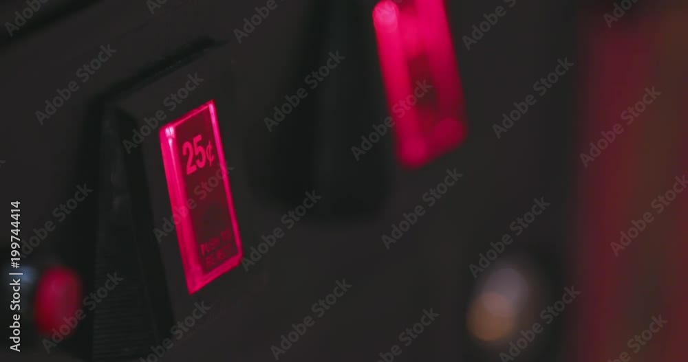 Inserting Quarter Into 25 Cent Arcade Machine Coin Slot Stock ビデオ ...