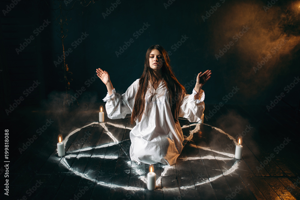Witch in pentagram circle, evocation of spirits Stock Photo | Adobe Stock