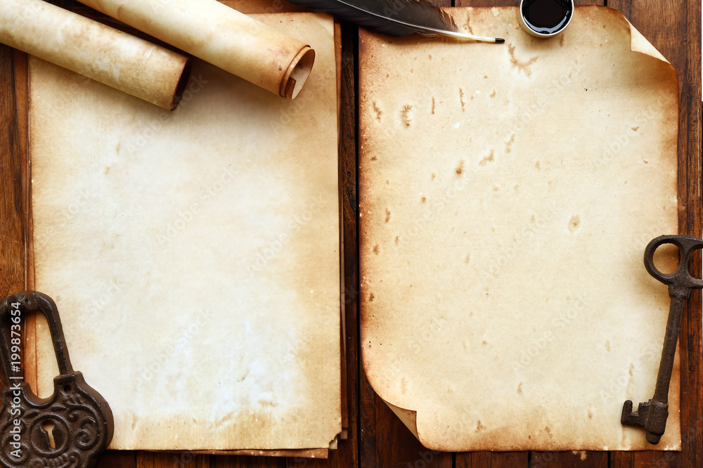 old paper on brown wood texture with feather and ink. Stock Photo ...