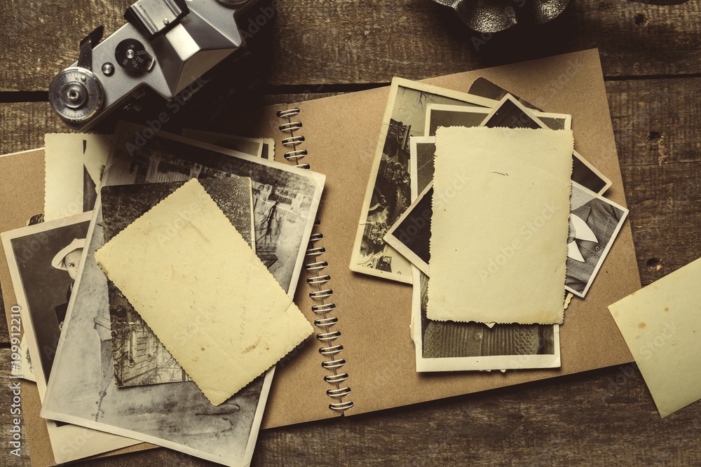 old photos on the wooden table Stock Photo | Adobe Stock