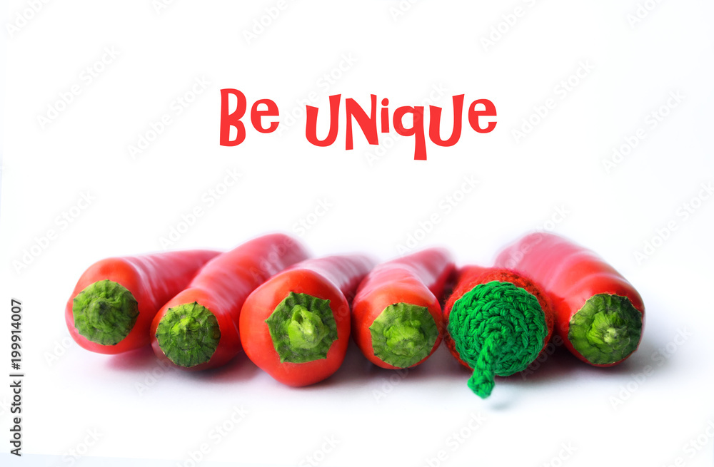 Five raw red hot peppers chilli and one crocheted red chilli. Funny ...