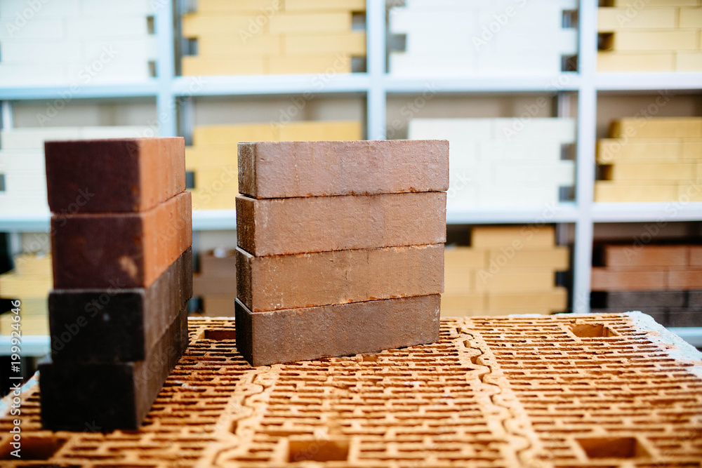 Racks with brick. Brick background, brick, brickwork, cement, concrete ...