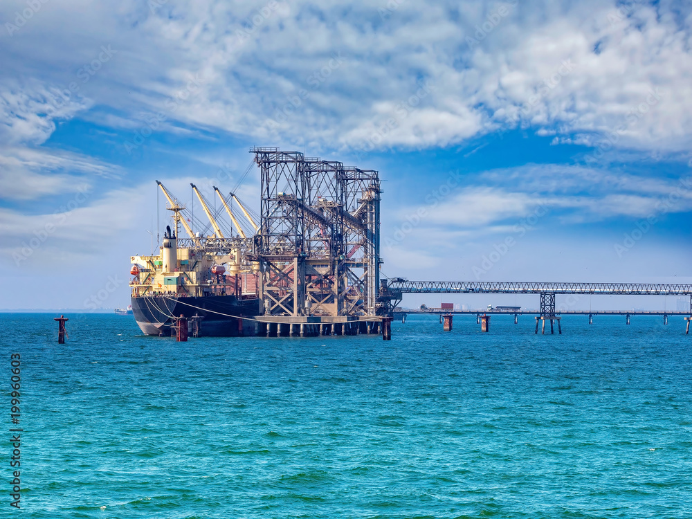 Bulk Vessel alongside at thailand port and loading bulk cargo by ...