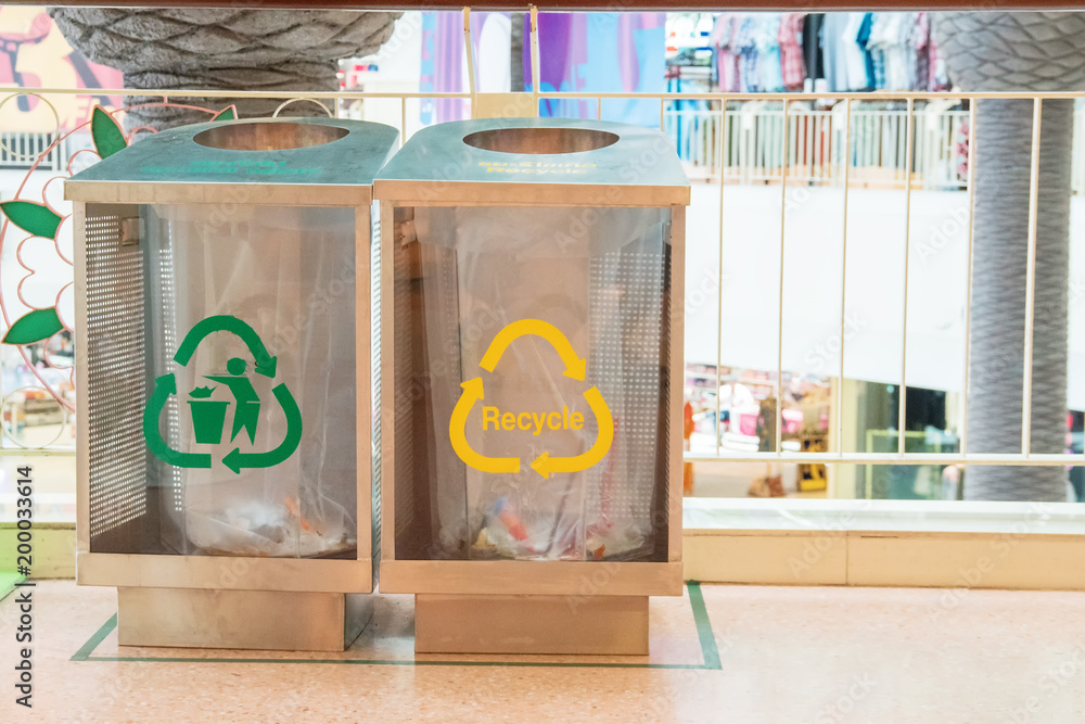 Modern transparent containers with signs for separate garbage waste in ...