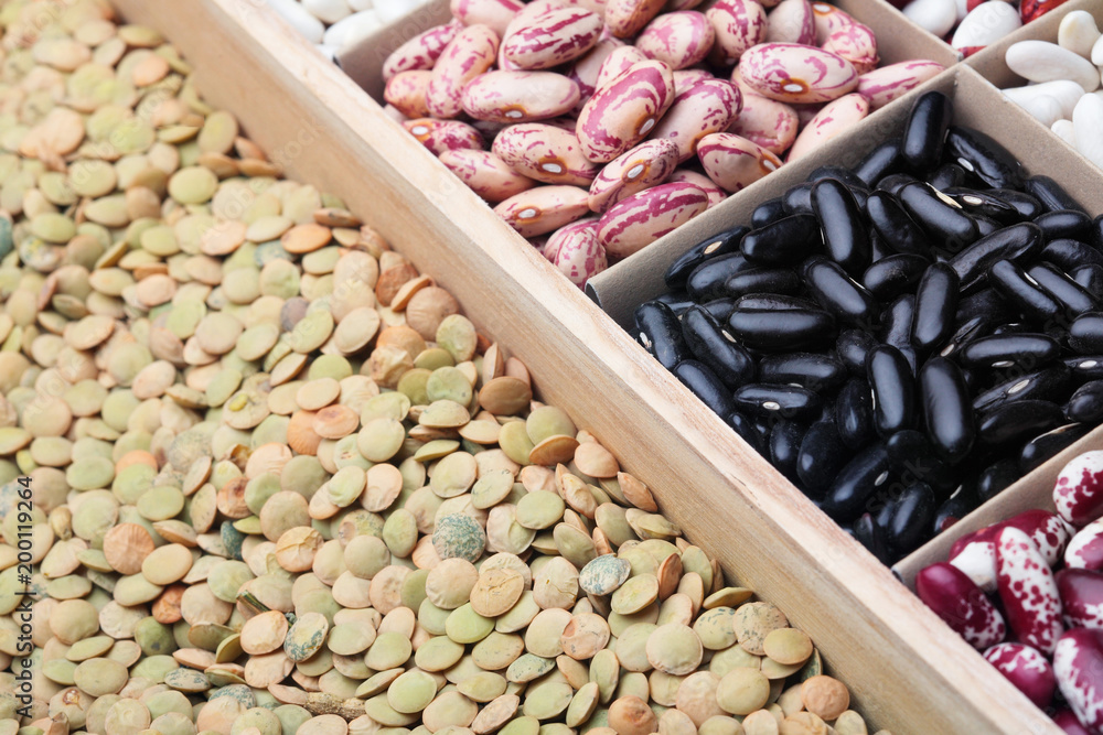 Different types of legumes beans. In wooden box.Varieties of beans.Top ...