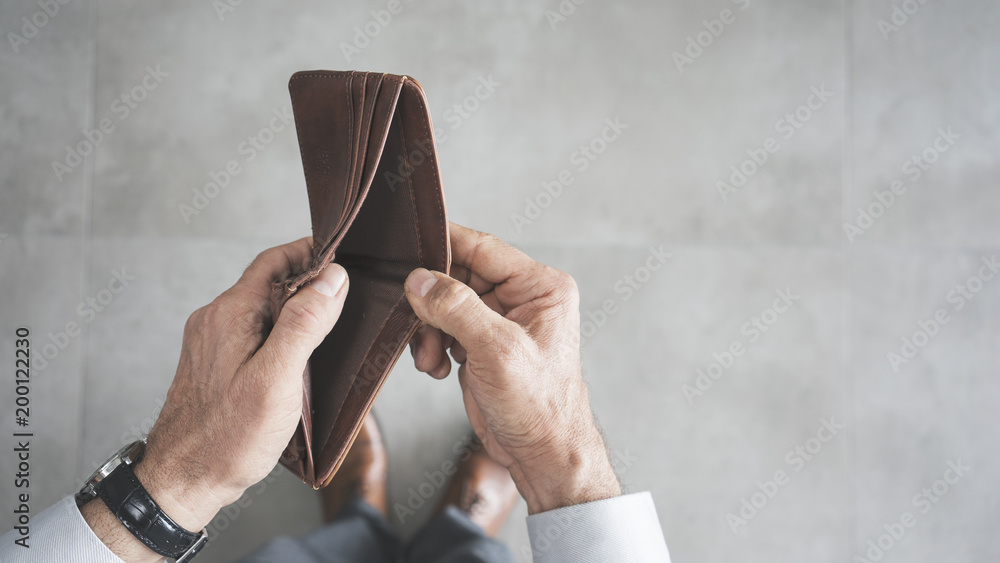 Man hand holding empty wallet Stock Photo | Adobe Stock