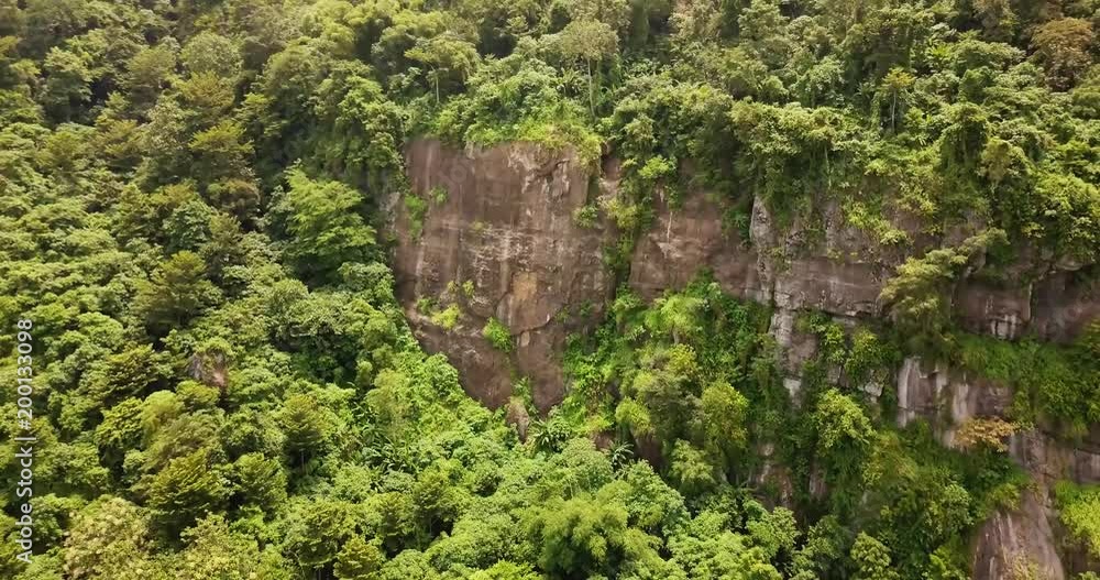 Beautiful aerial view of tropical forest and cliff near the Cimarinjung ...