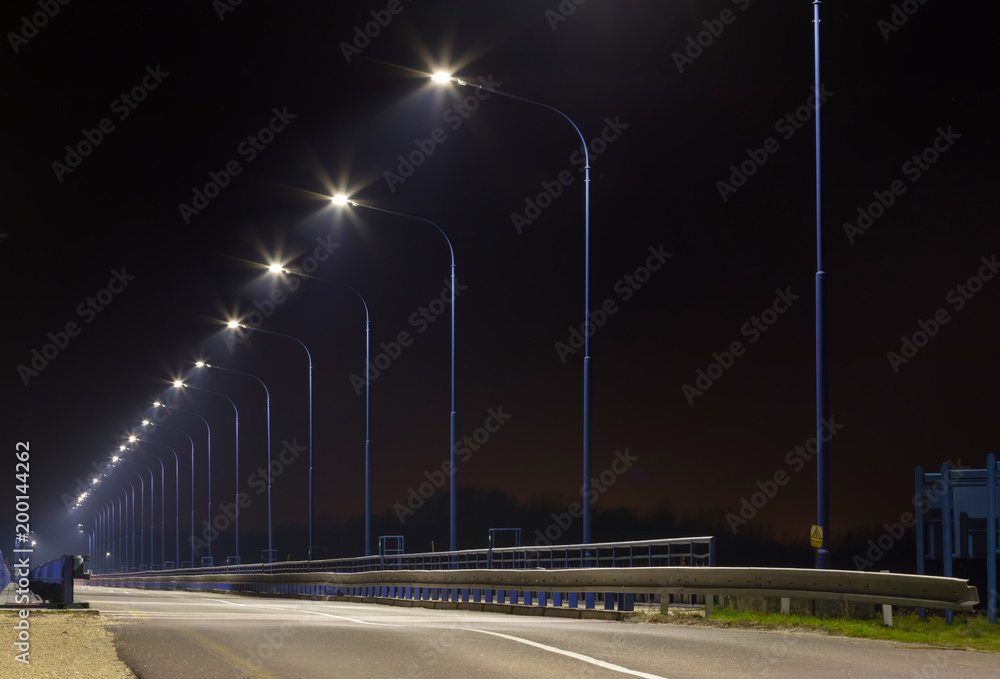 empty street at night with modern LED streetlights Stock Photo | Adobe ...