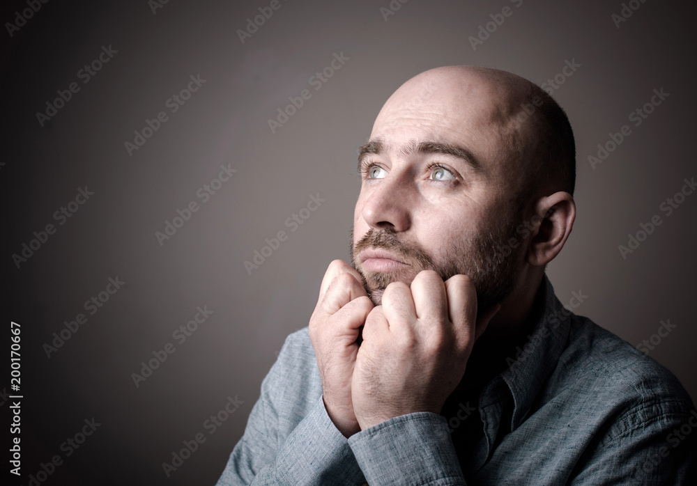 depressed sad bald man Stock Photo | Adobe Stock