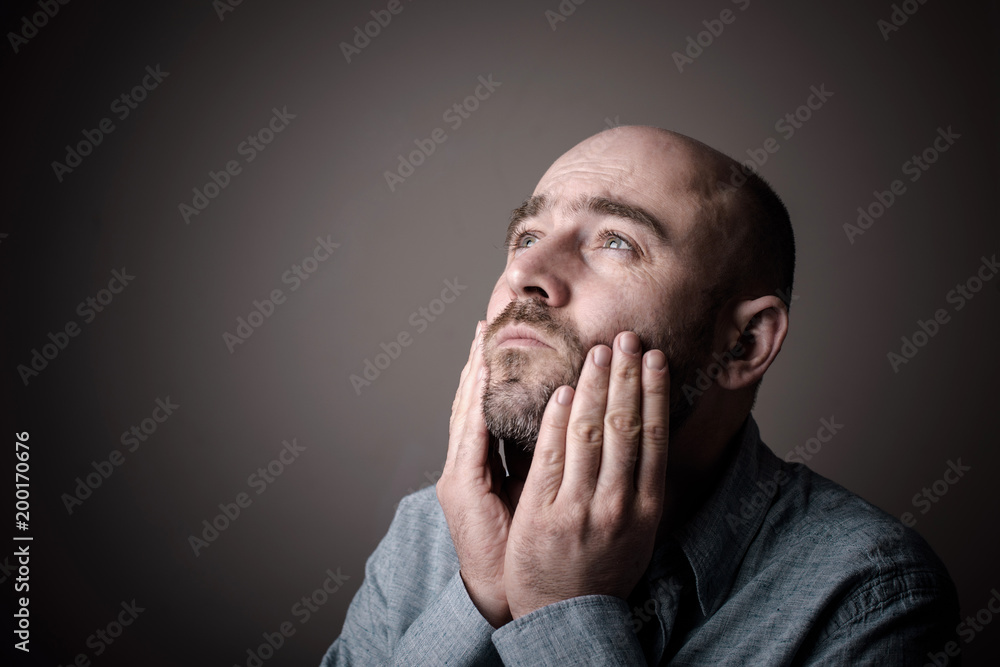 depressed sad bald man Stock Photo | Adobe Stock
