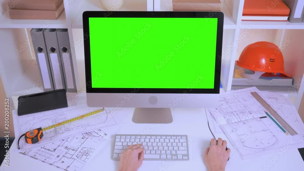 top view invisible architect working on computer. female fingers typing ...