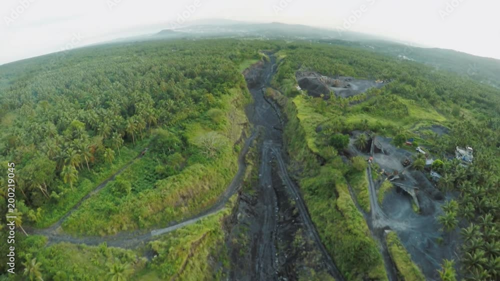 Aerial photography of volcanic outflowing river for ash. Legazpi city ...