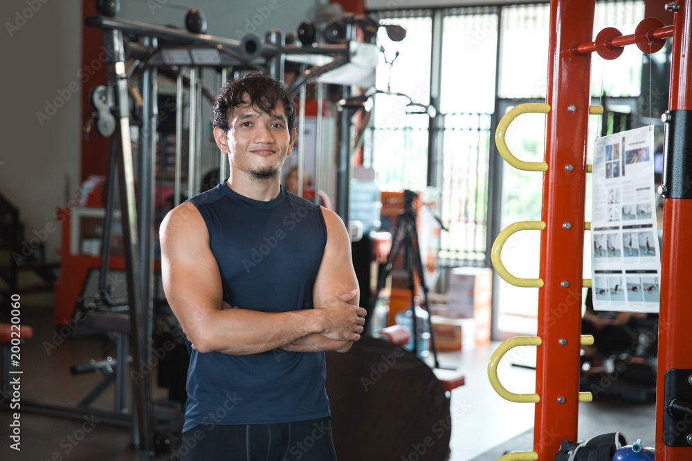 Handsome sports man standing look camera Stock Photo | Adobe Stock