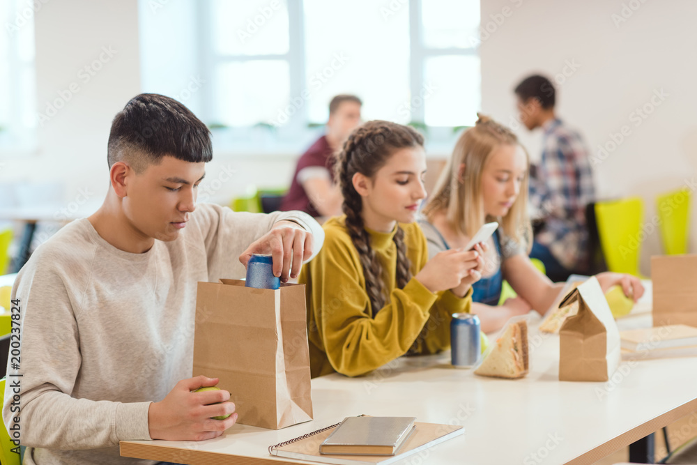 teenage high school students at school cafeteria during lunch Stock ...
