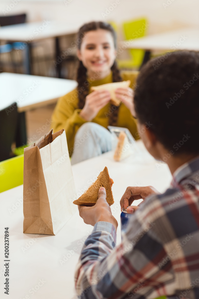 high school students eating sandwiches at school cafeteria Stock Photo ...