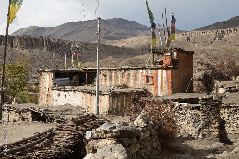 Image of Colorful Traditional stone houses in Muktinath village in ...