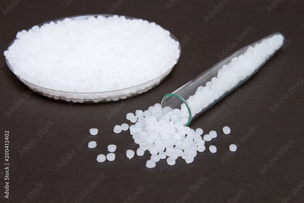 Foto Stock Plastic pellets. Transparent Polyethylene granules. Plastic ...