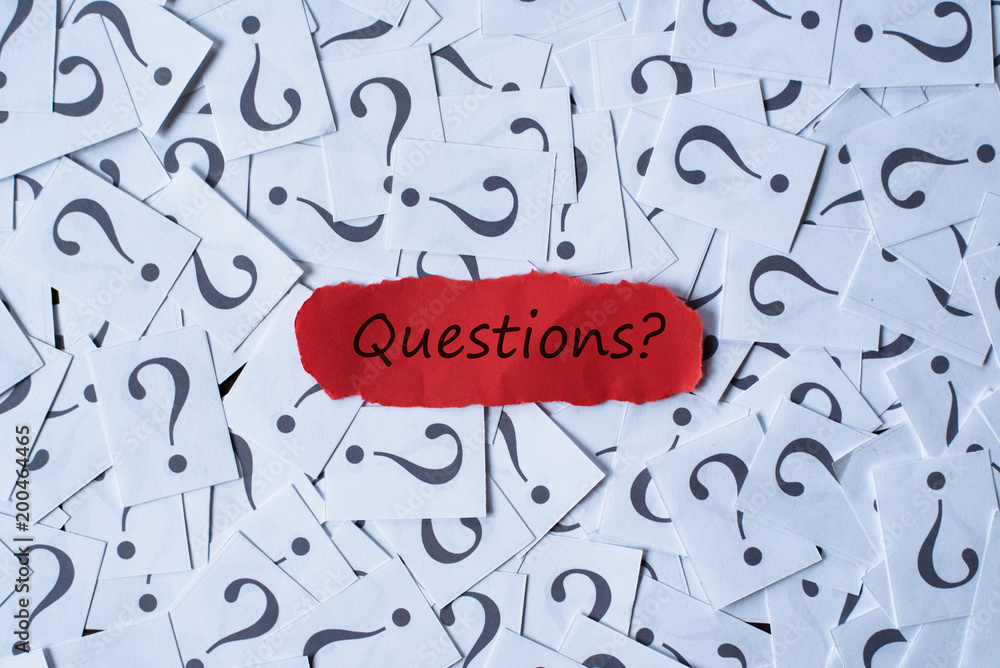 white paper with QUESTION MARK and red paper with QUESTIONS?. Q&A and ...