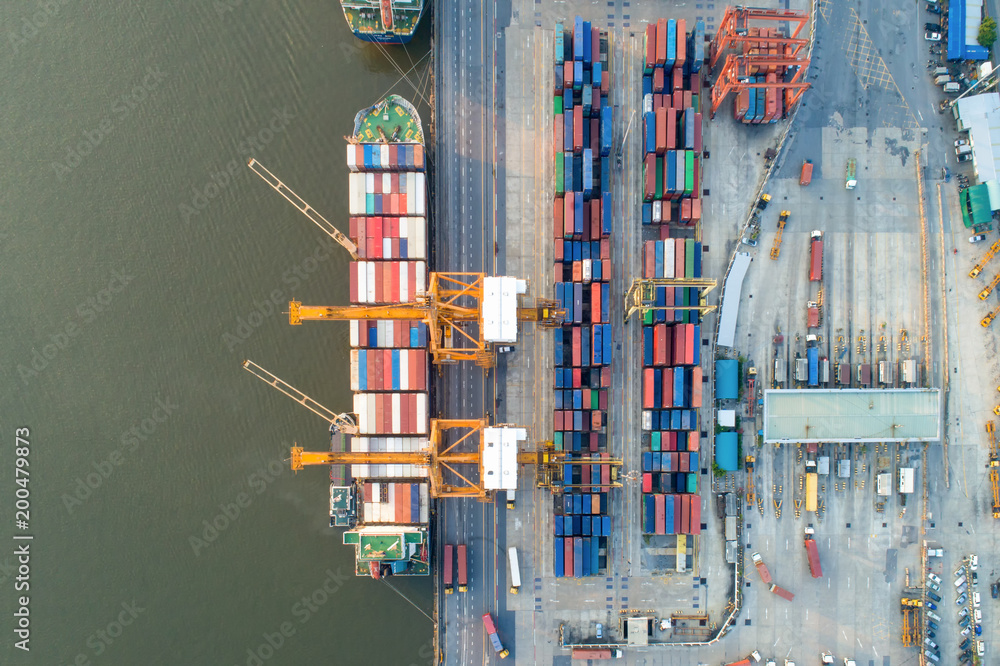 Aerial view of Containers yard in port congestion with ship vessels are ...