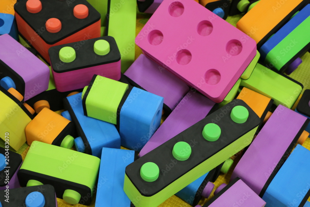 Children's constructor. Big pile plastic toy blocks. Background of ...