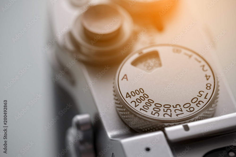 shutter release button and shutter speed dial of vintage camera ...