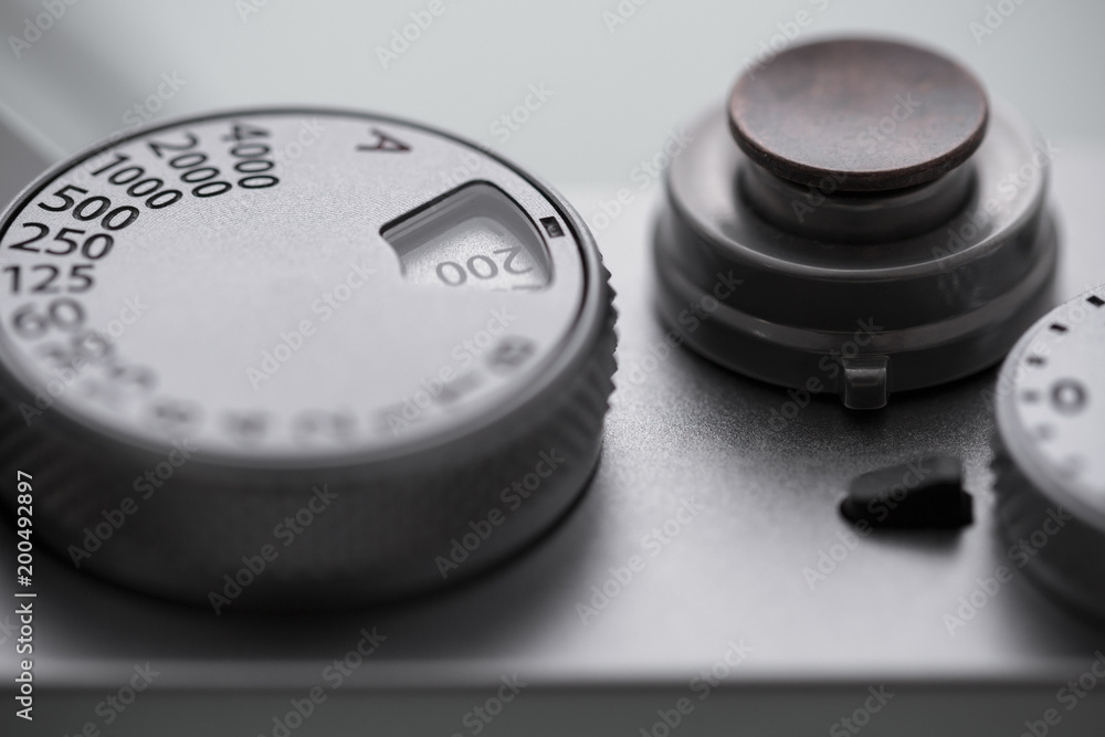 shutter release button and shutter speed dial of vintage camera ...