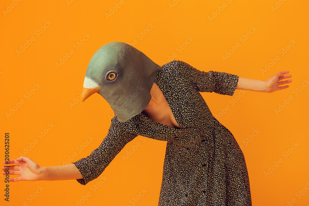 Poster Woman wearing pigeon mask and going to run – Wall Art | UkPosters