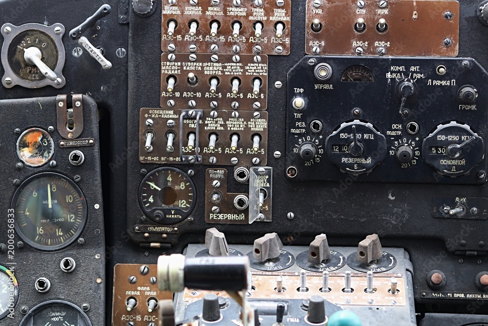 Control paneil detail with visible switches, dials and throttle lever ...