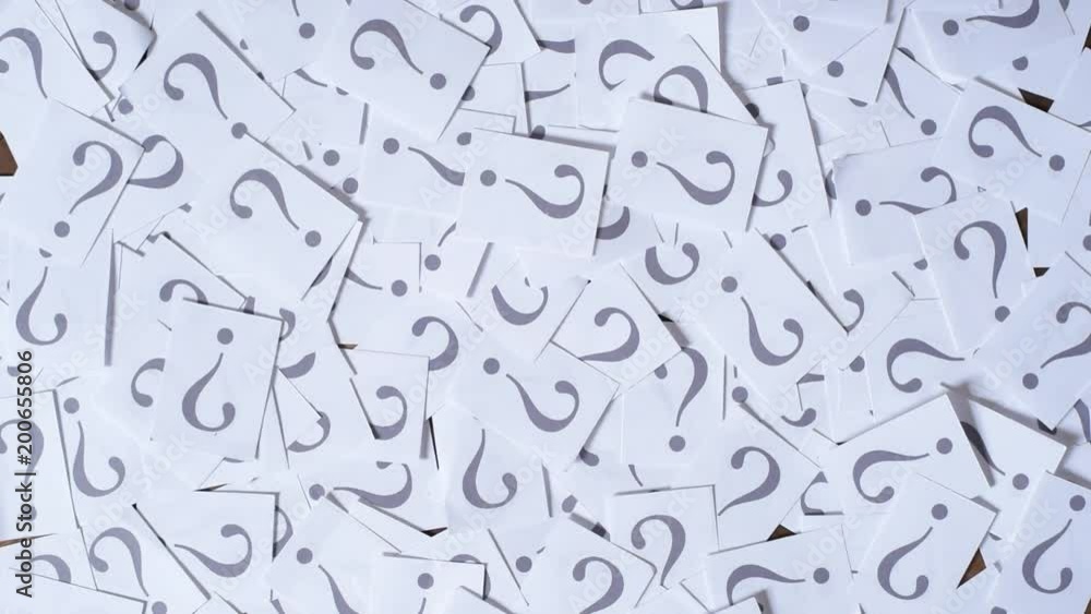 white paper note with QUESTION MARK dropping or falling on question ...