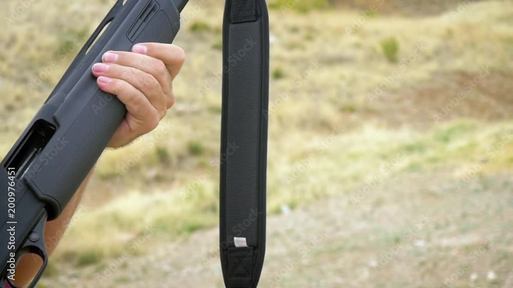 Video „Man ejects a shotgun shell from a smoking gun chamber in slow ...