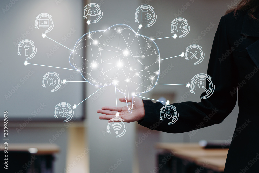 hand of businesswoman in gesture showing Polygonal brain shape of an artificial intelligence ...