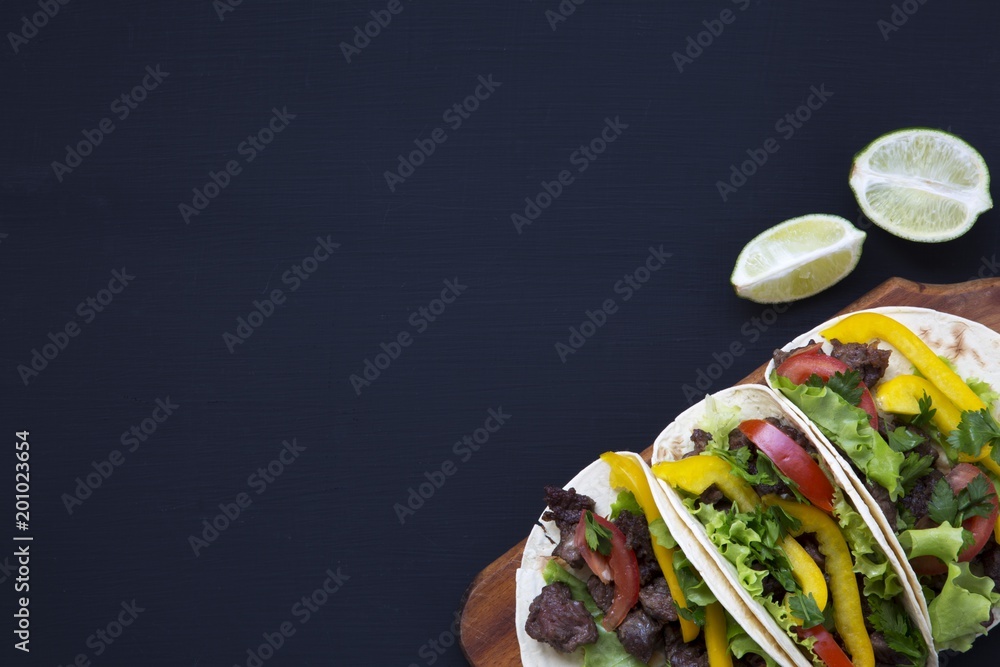 Mexican street tacos flat lay composition with beef and vegetables ...