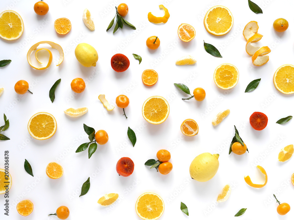 Creative flat layout of fruit, top view. Sliced orange, lemon ...