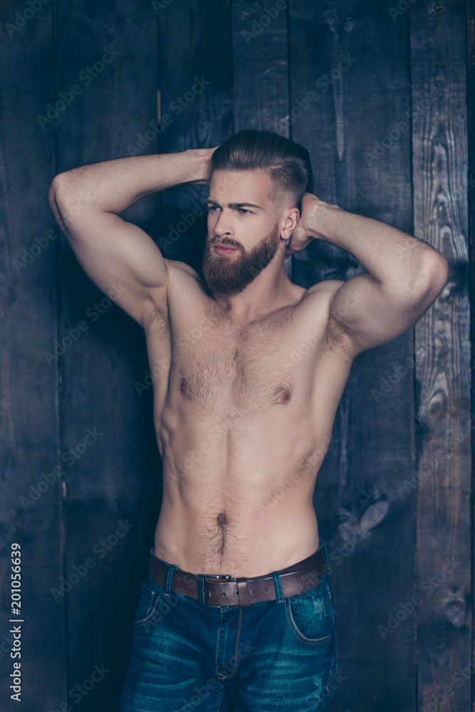 Vertical portrait of handsome attractive stunning muscular brutal ...