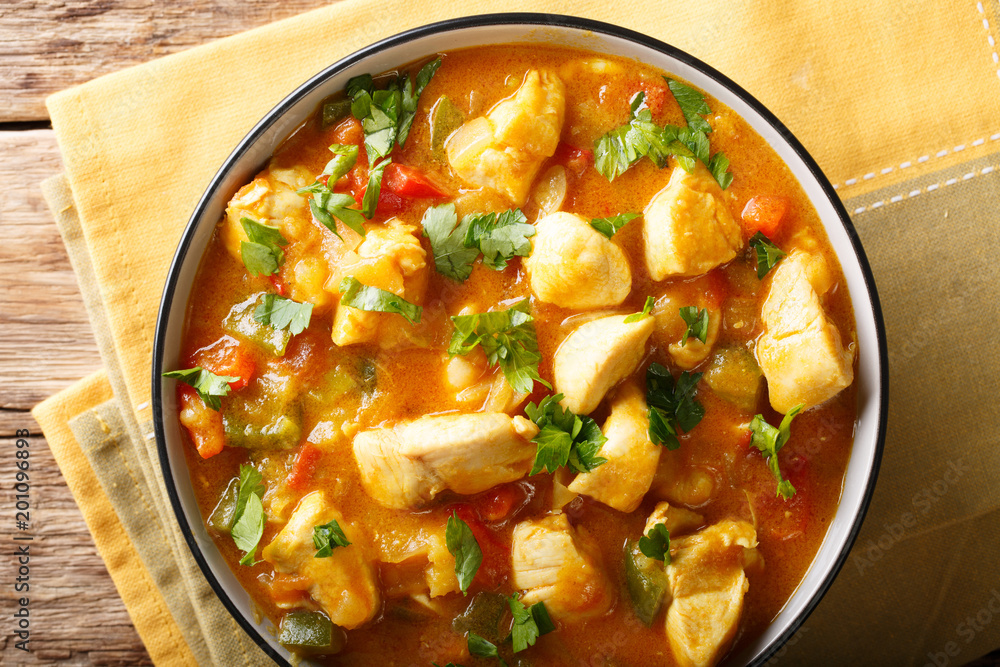 Foto de Brazilian traditional Bobo chicken with vegetables in coconut ...