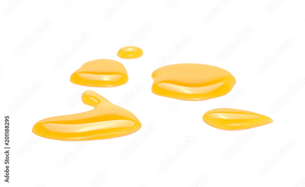 Puddle of orange juice isolated on white background, clipping path ...