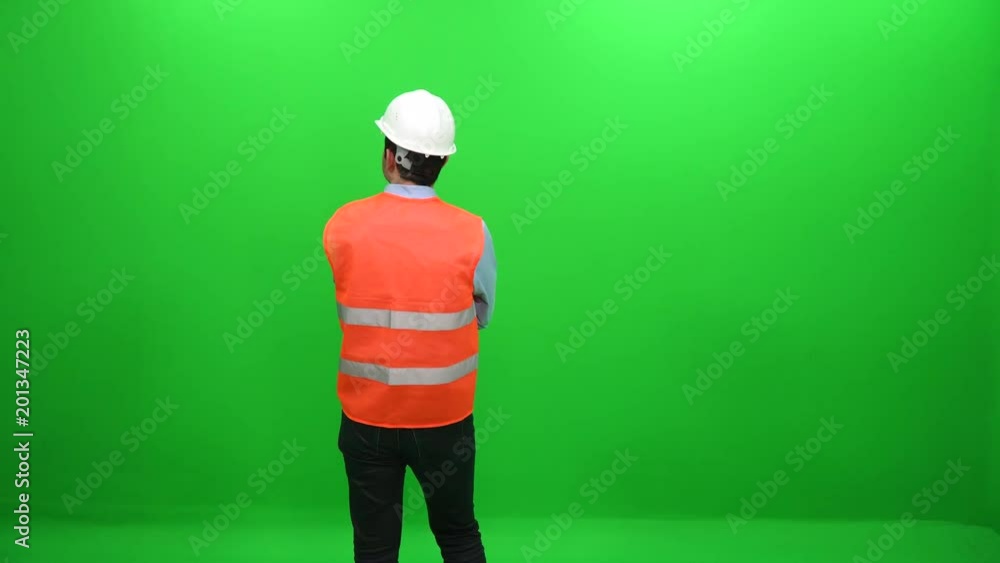 Rear View of Architect Wearing Helmet on Green Screen Stock ビデオ | Adobe ...